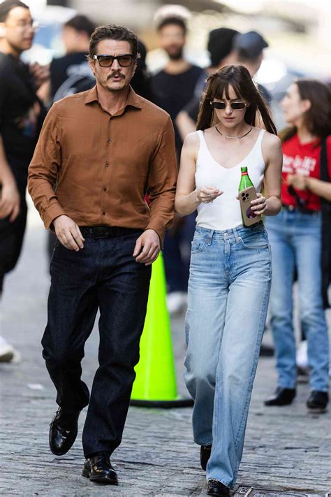 Dakota Johnson Reveals Why Pedro Pascal Always Steals Her Clothes