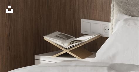 램프와 책이있는 침대 사진 Unsplash의 무료 리비우 이미지