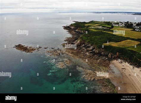 The Beautiful Landscape Of Brittany In France With Green Cliffs Trees
