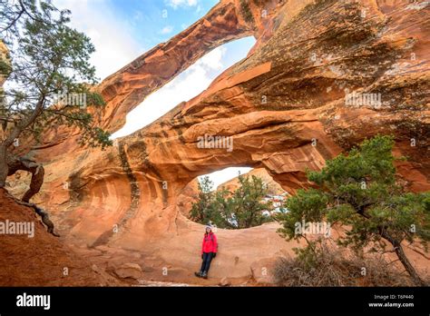 Hiker At Double O Arch Rock Arch Devils Garden Trail Arches National Park Moab Utah Usa