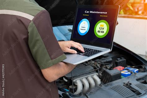 Closeup Man S Hand Typing On Laptop Computer Keyboard To Check The Operation Of The Car Engine
