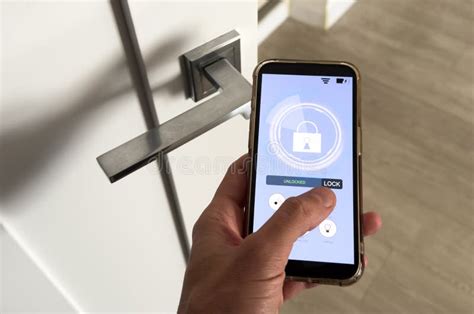Smart Home Automation App On Smartphone Hold By Female Hand With Home Interior In Background Smart Home Automation App On Smartphone Hold By Female Hand With Home Interior In Background