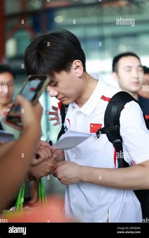 Paris Olympics Gold Medalist Liu Yukun Receives Warm Welcome At The Airport In Beijing China