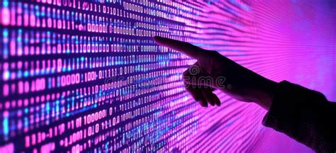 A Person S Hand Engaging With A Wall Of Binary Code Illustrating The Fusion Of Human