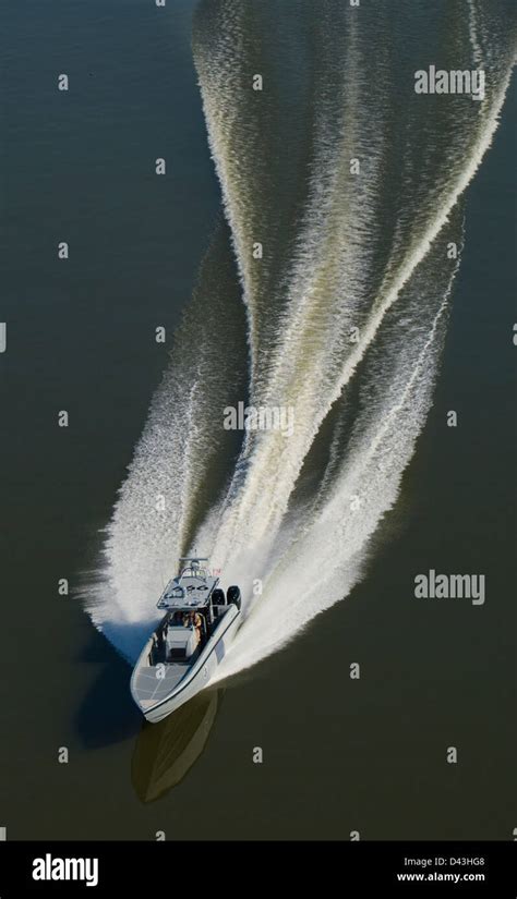A Cbp Helicopter An Astar Model Is Seen In Flight As Part Of Border Patrol Operations