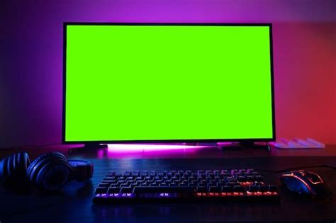 Premium Photo Green Screen Monitor With Powerful Personal Computer For
