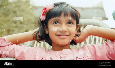Portrait Of A South Asian Girl From India Wearing Pink In Shimla