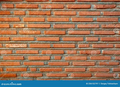 Outdoor Brick Wall Made From Narrow Long Bricks For Background Stock