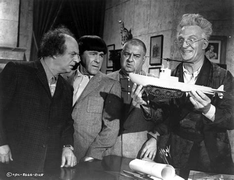 Film Still Of Emil Stika Carrying A Model Ship And Co Stars Photo Print 8 X 10