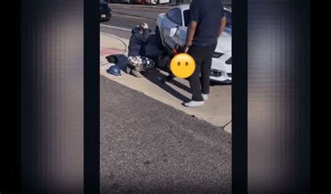 Dude Gets His Head Stuck Under A Car Wheel After He Was Hit By A