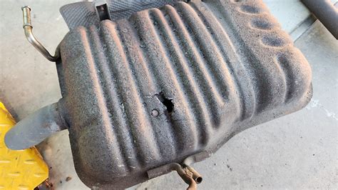 뉴카렌스 소음기 교체