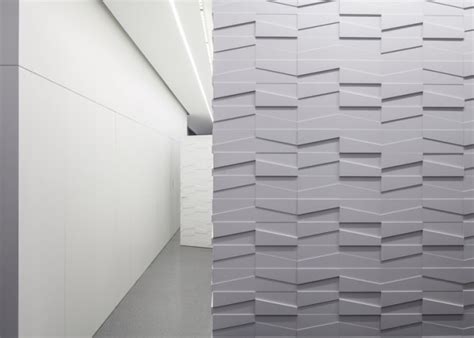 Geometric Panels Create Textured Walls In Apartment By Pitsou Kedem