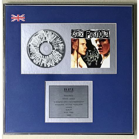 Sex Pistols Kiss This Bpi Silver Lp Award Presented To Guitarist Steve