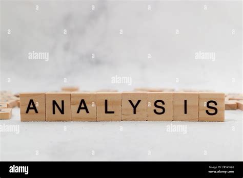 Top View Of Analysis Word On Wooden Cube Letter Block On White