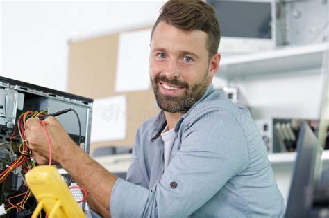 Happy Man Fixing Computer Stock Photo Image Of Computer 277100864