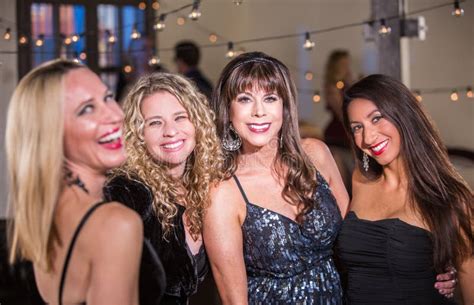 Four Women Smiling At A Party Stock Photo Image Of Adult Posing
