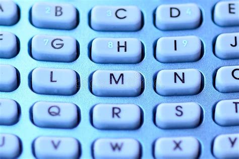Detail Of A Blue Alphabetic Keyboard Stock Image Image Of Buttons