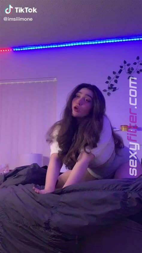 Simone Shows Cleavage In Alluring White Crop Top