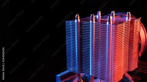 processor CPU fan installed on the motherboard on a black background Stock ビデオ Adobe Stock