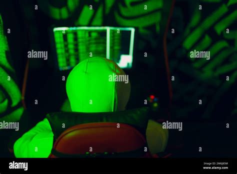 hacker using computer malware software and hacking binary code digital