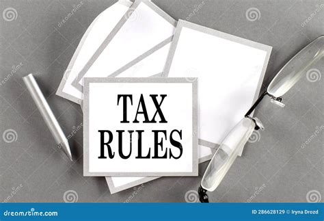 TAX RULES Text Written On A Sticky With Pencil And Glasses Stock Image Image Of Strategy