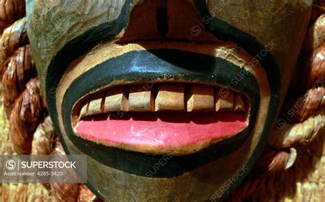 Native American Wood Carving Closeup Showing Teeth Lips And Part Of