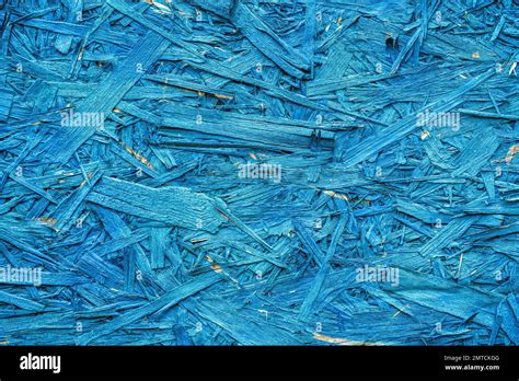 Osb Plate Is Blue Abstract Texture Of Building Material Made Of Environmentally Friendly