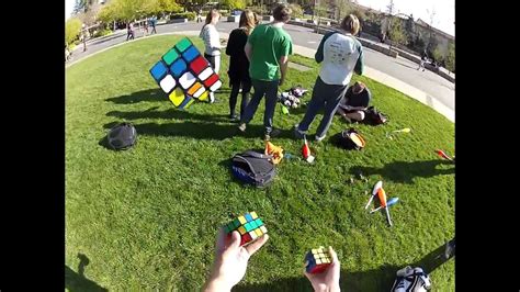 A Guy Solves Rubix Cubes Whilst Juggling Them