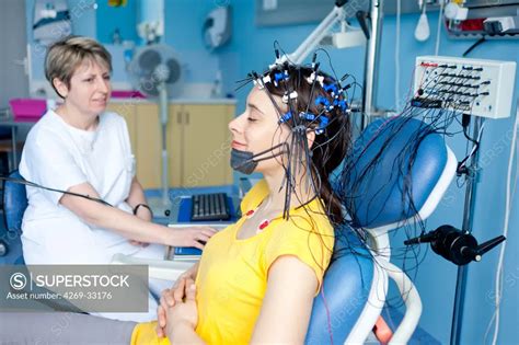 Woman Undergoing An Electroencephalogram EEG Limoges Hospital France SuperStock