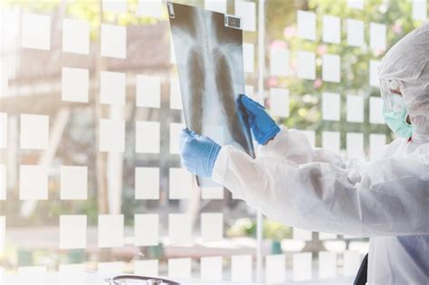 Premium Photo Scientist Analyzing X Ray In Laboratory