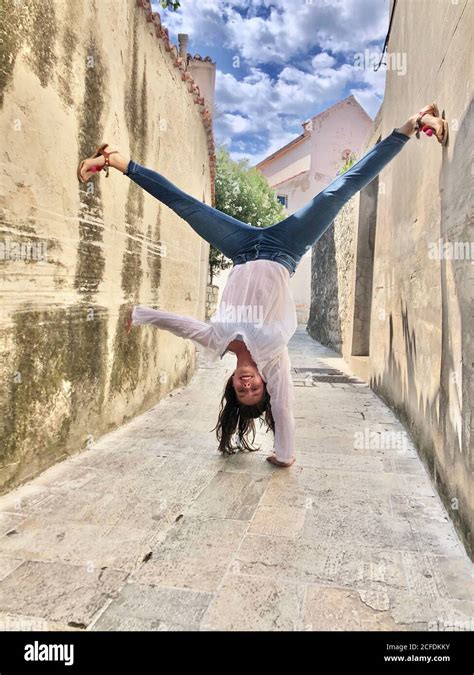 One Handed Handstand Young Woman Old Town Alleys Blue Sky Stone Floor Summer Joie De