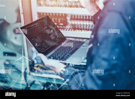electricity engineer work using ai computer software control monitor