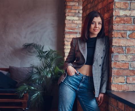 Premium Photo | Portrait of a sexy slim young female in a jacket and ...