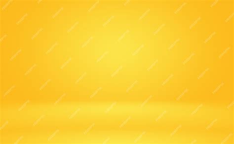 빛나는 노란색 그라데이션 스튜디오 벽 룸 배경의 추상 솔리드 무료 사진