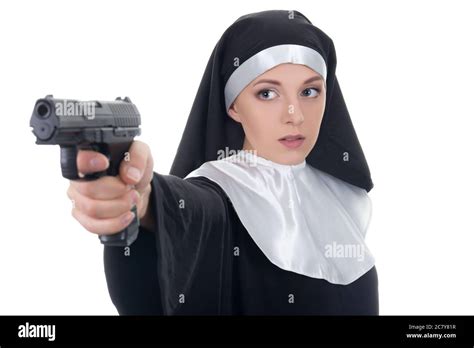 Young Woman Nun Shooting With Gun Isolated On White Background Stock
