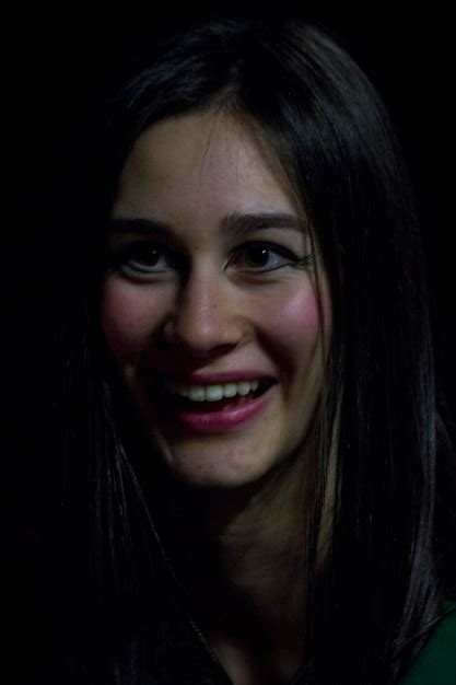 Premium Photo Close Up Portrait Of A Smiling Young Woman