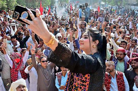 Female Singer Performing A Sindhi Song On The Stage During Culture Program During The Sindhi