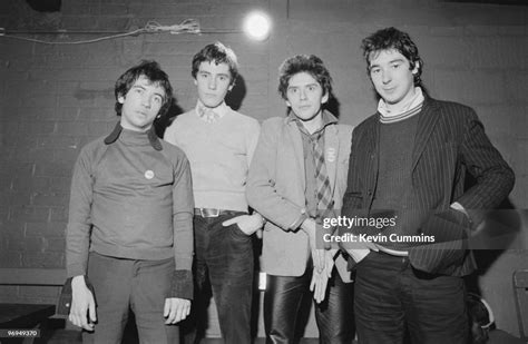 Singer Pete Shelley Drummer John Maher Bassist Steve Garvey And