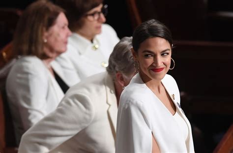 Alexandria Ocasio Cortezs Wore Three Significant Pins To Trumps State
