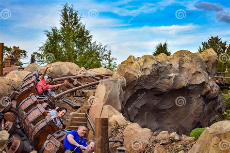 People Enjoying Seven Dwarf Mine Train In Magic Kingdom At Walt Disney