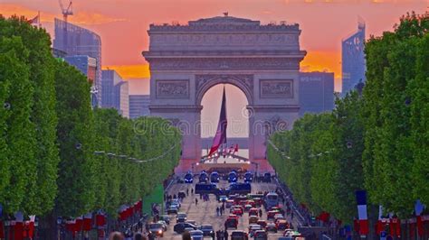 Arc De Triomphe Against The Backdrop Of A Beautiful Sunset French Flag