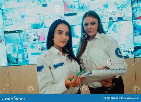 Group Portrait Of Female Security Operator While Working In A Data System Control Room Offices