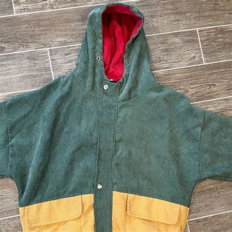 Multi Colored Zip Up Jacket Has Snaps On Top Of The Depop