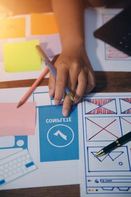 Premium Photo The Designer Team Is Designing The Uxui System To Make The Uxui System Work Well