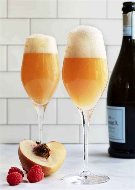 The Best Peach Bellini Recipe Pinch And Swirl