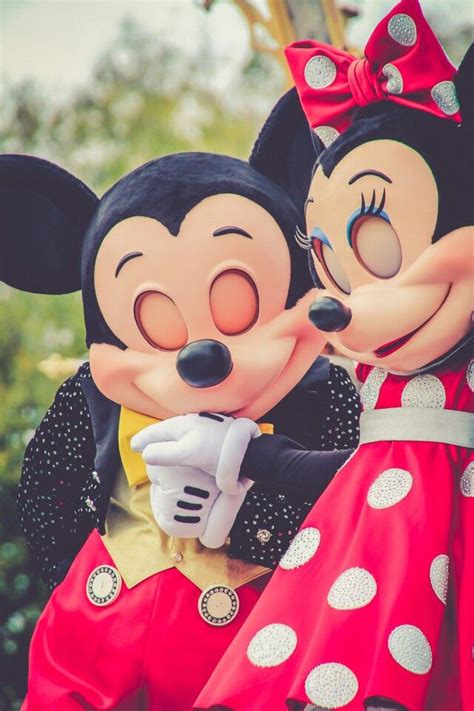 Mickey Happily Kisses Minnies Hand While Performing In The Dream Along
