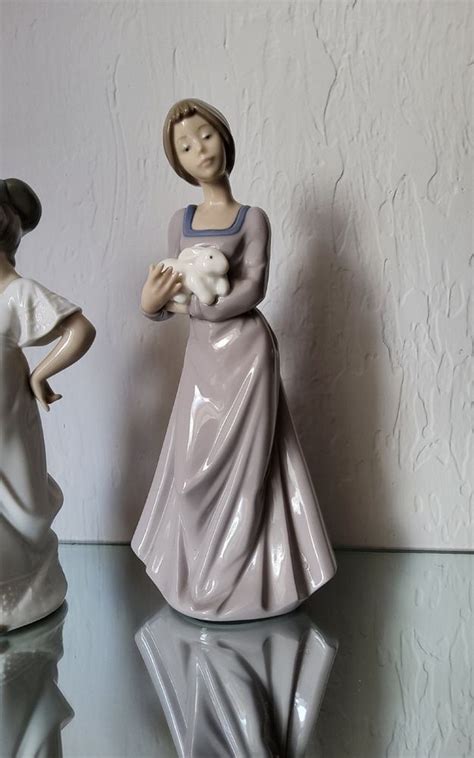 Статуетка колекційна порцелянова Nao By Lladro дівчина з кроликом 1 300 грн