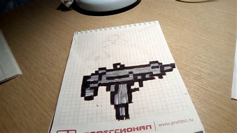 Как нарисовать пистолет по клеточкам