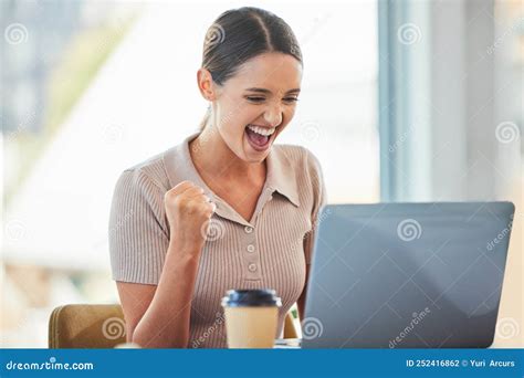 My Luck Doesnt Seem To Run Out A Young Businesswoman Cheering While Using Her Laptop Stock