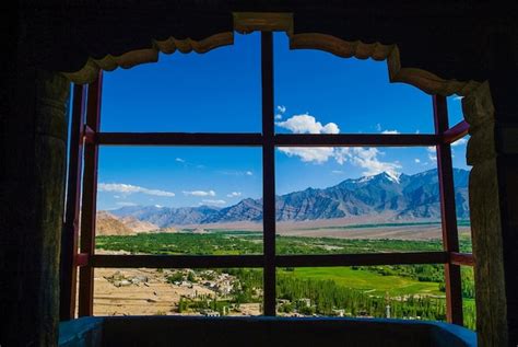 Premium Photo Scenic View Of Landscape Seen Through Window